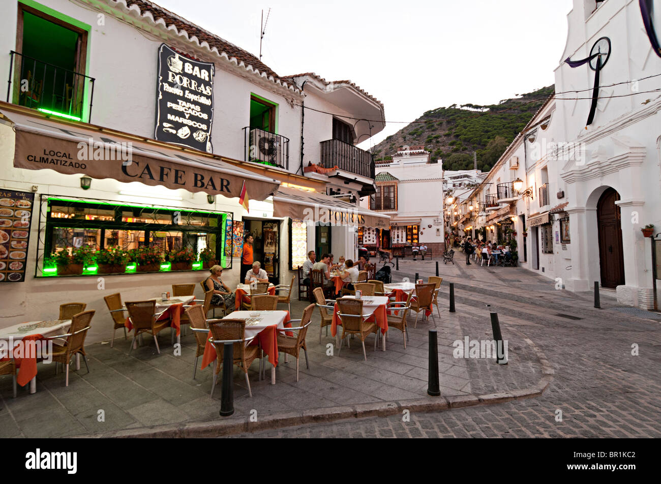 mijas spain streets with restaurants in town Stock Photo - Alamy