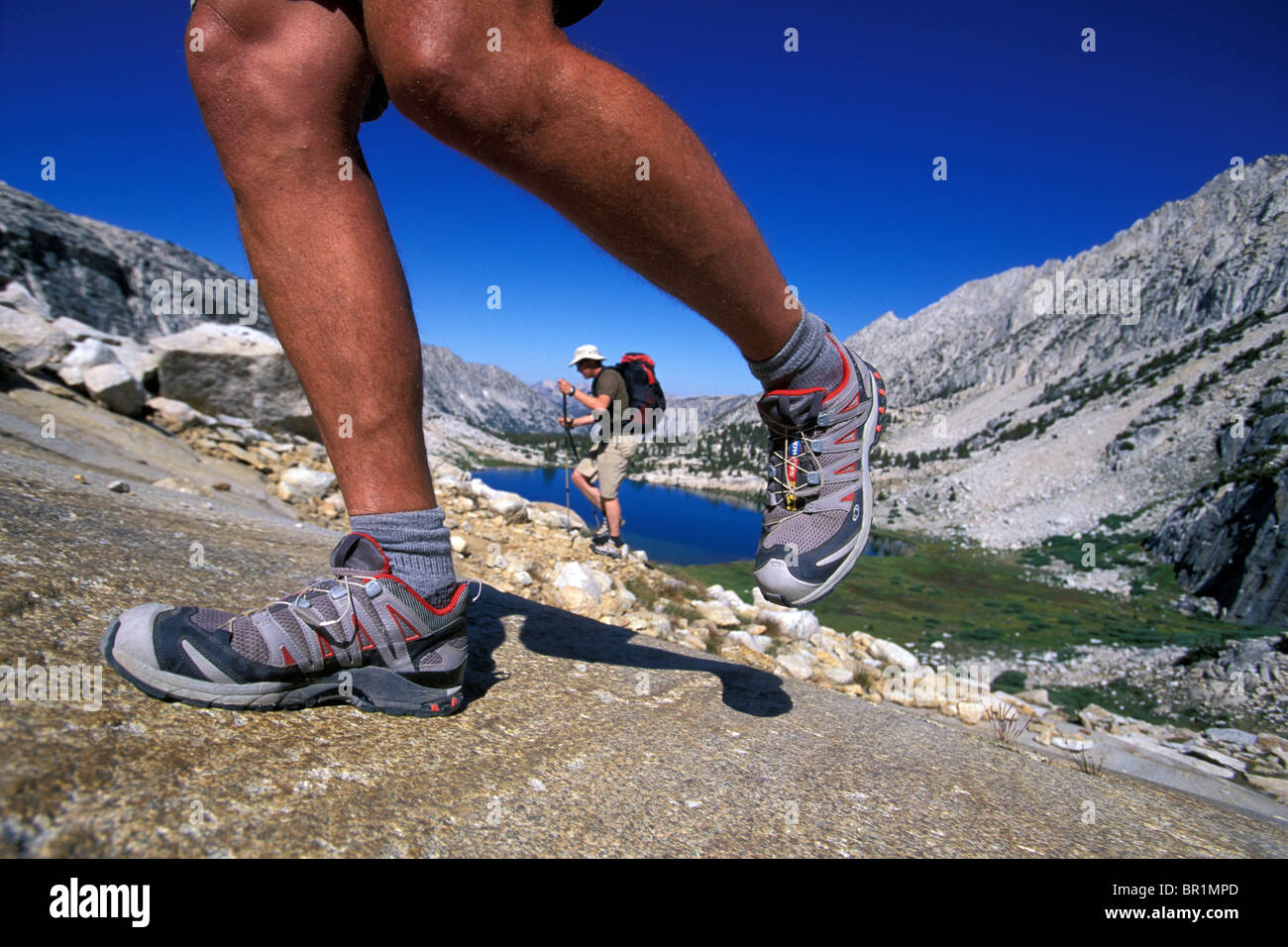 Legs and backpacker in eastern Sierra Nevada mountains, California ...