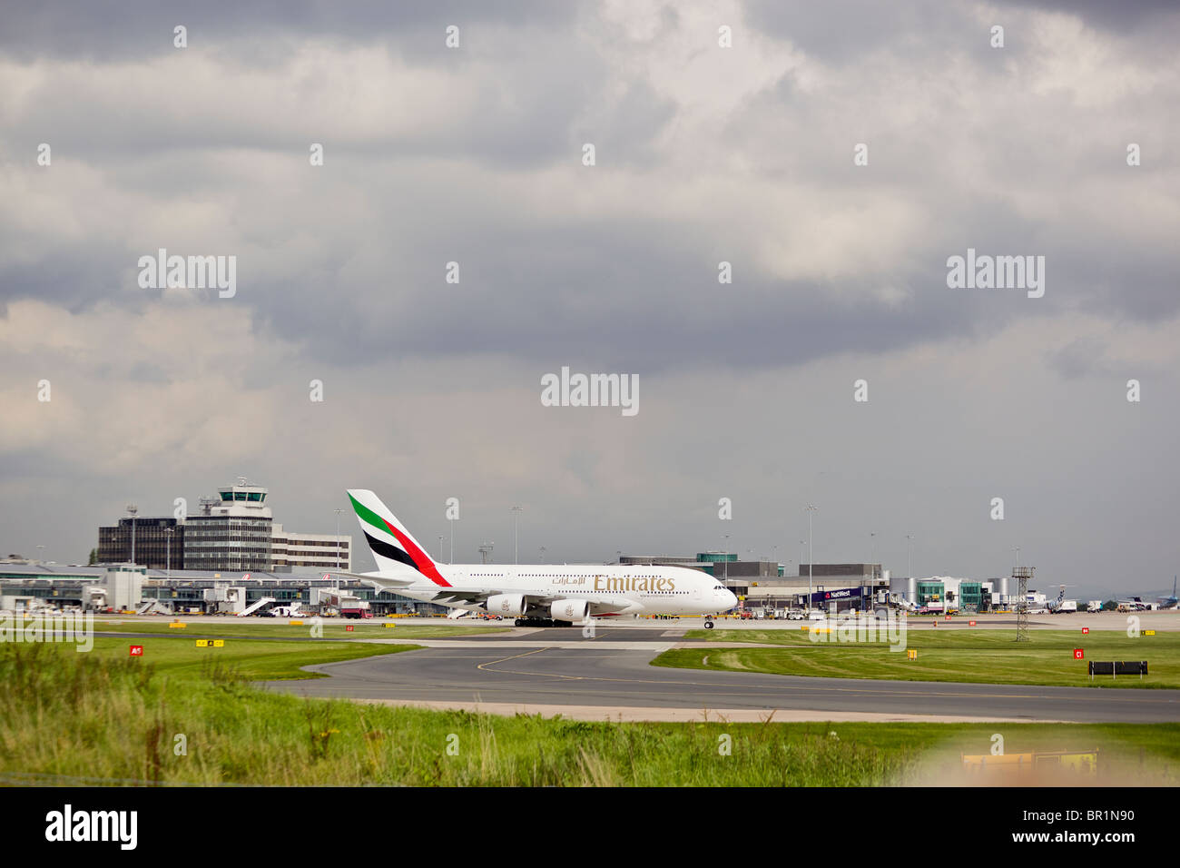 Emirates airline Airbus A380 arrives at Manchester airport Stock Photo ...