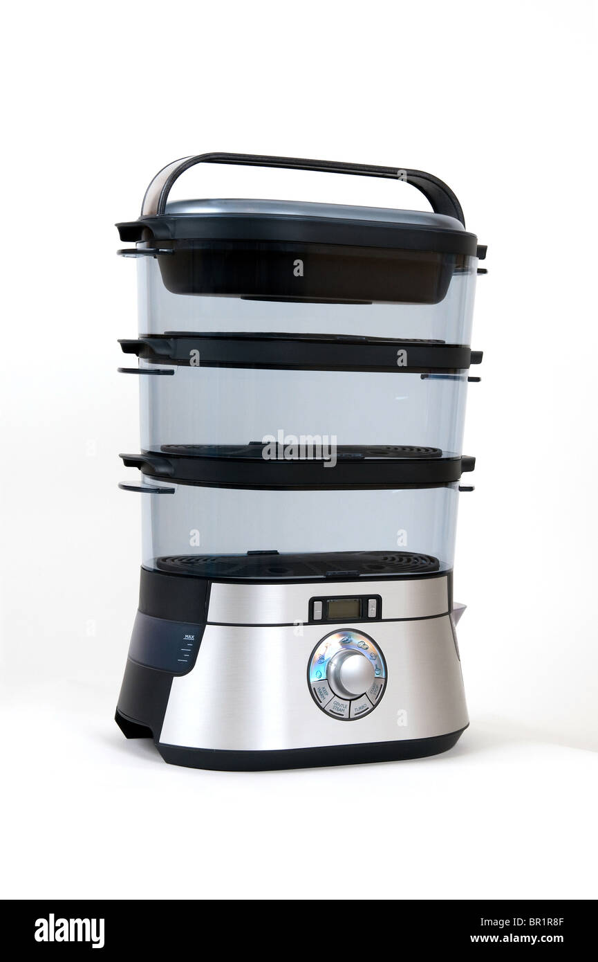 modern electric steamer on a white background Stock Photo - Alamy