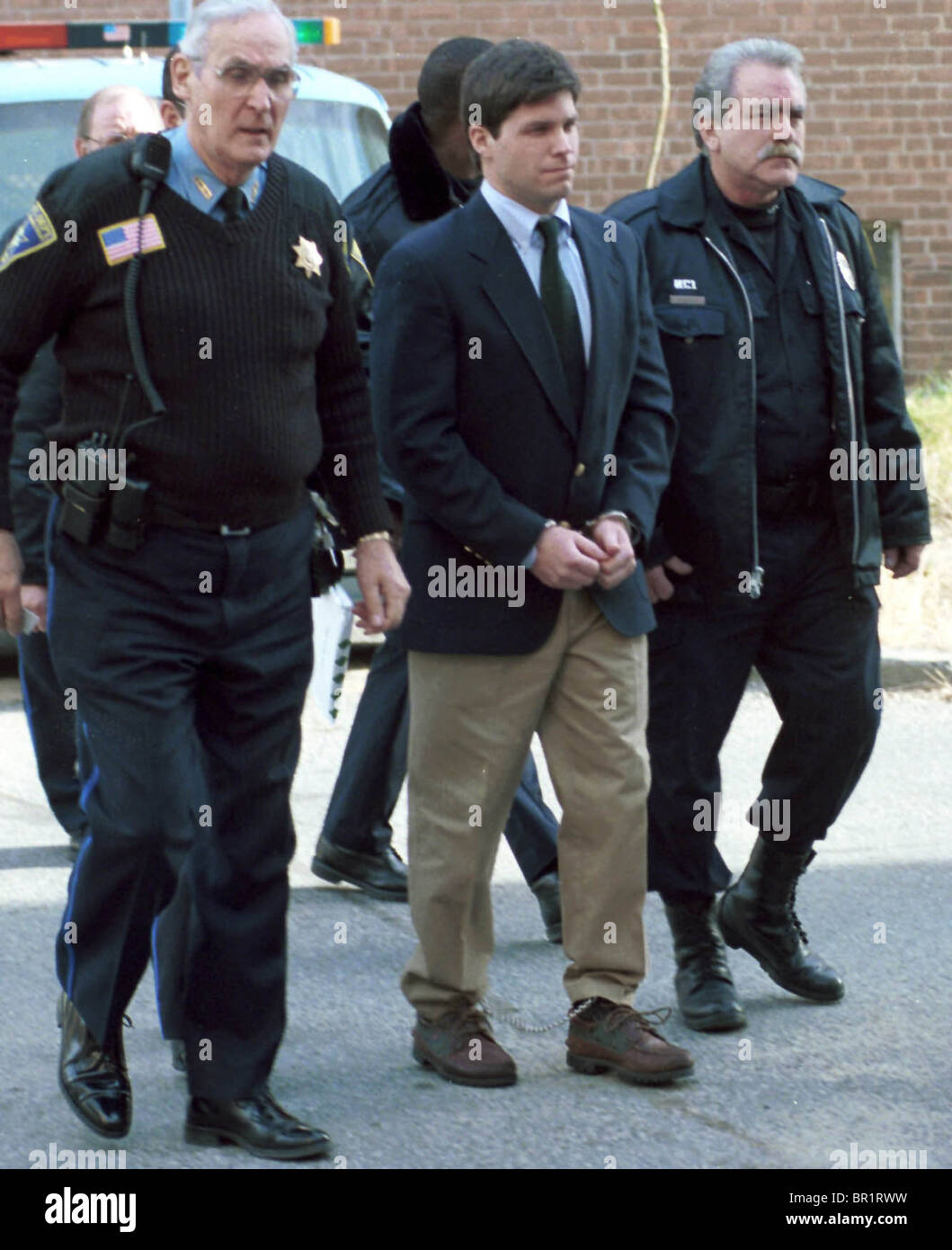 Convicted rapist Alex Kelly is led out of Stamford Superior Court in ...