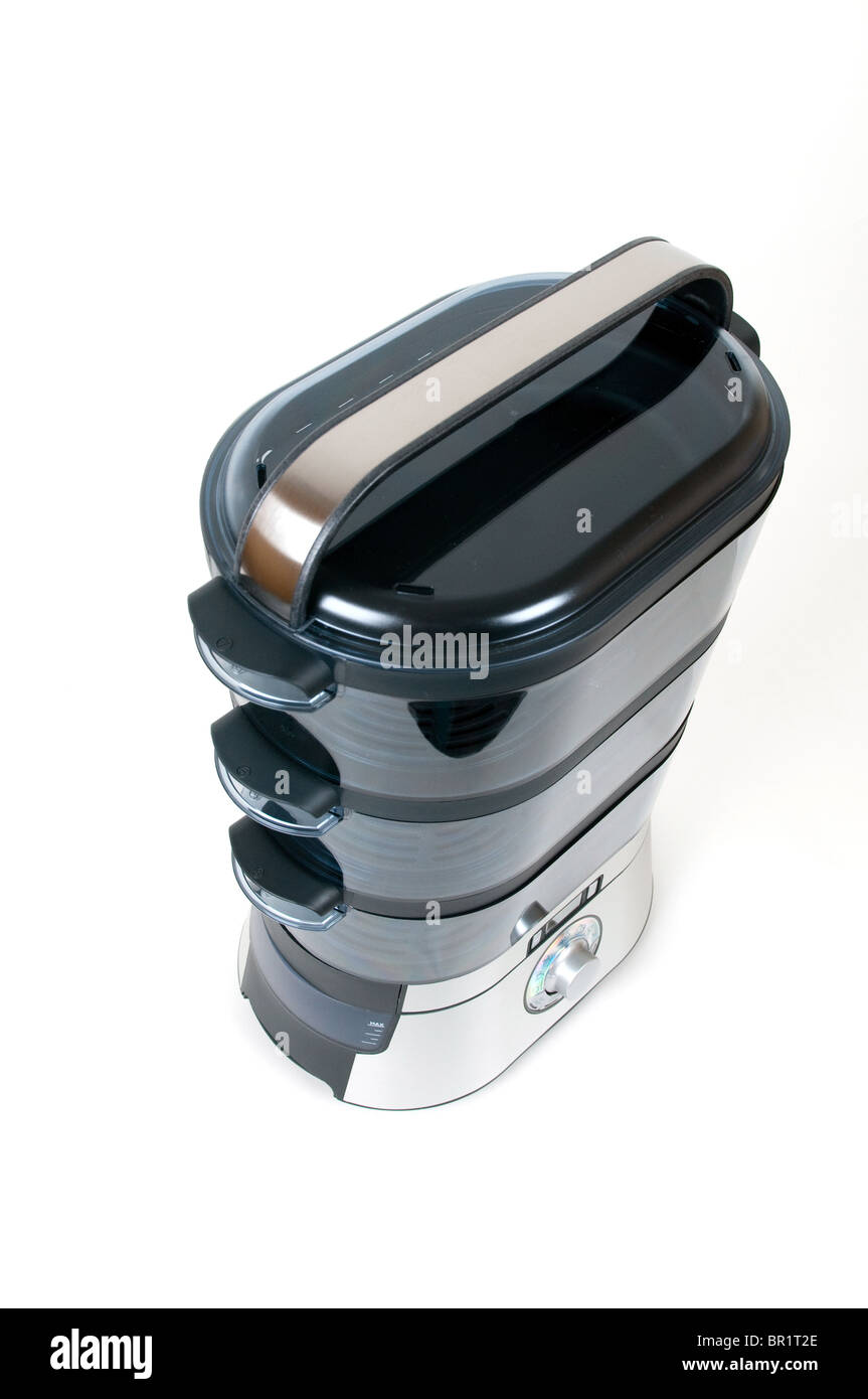 modern electric steamer on a white background Stock Photo - Alamy