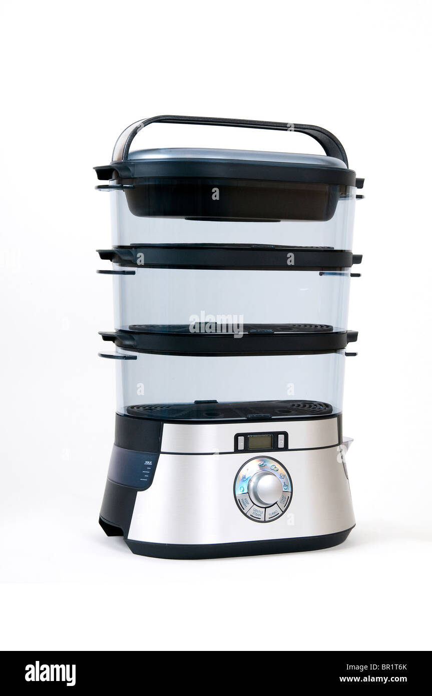 modern electric steamer on a white background Stock Photo - Alamy