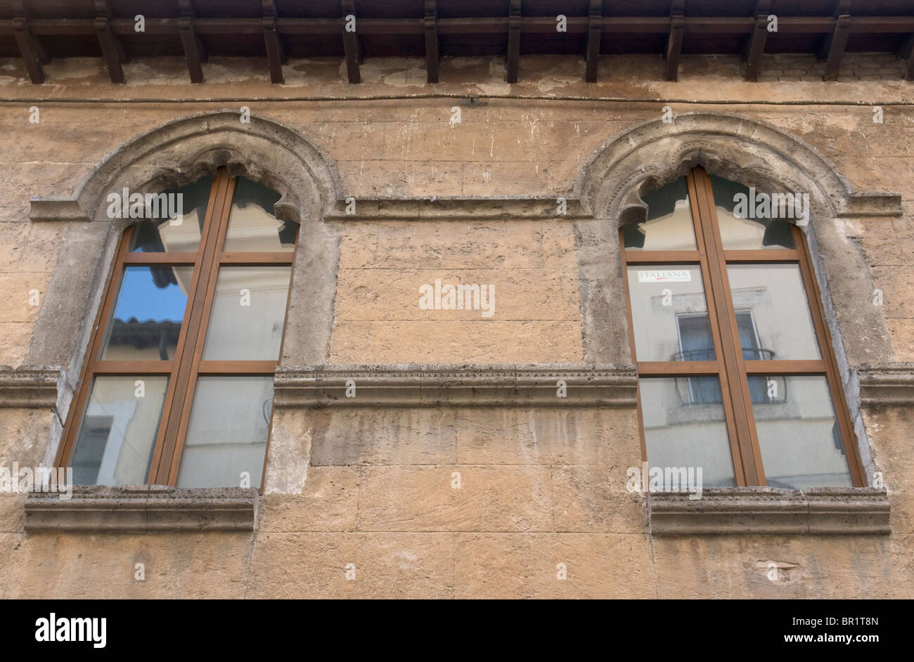 Ornamented windows in an old palace in Cittaducale, province of Rieti ...