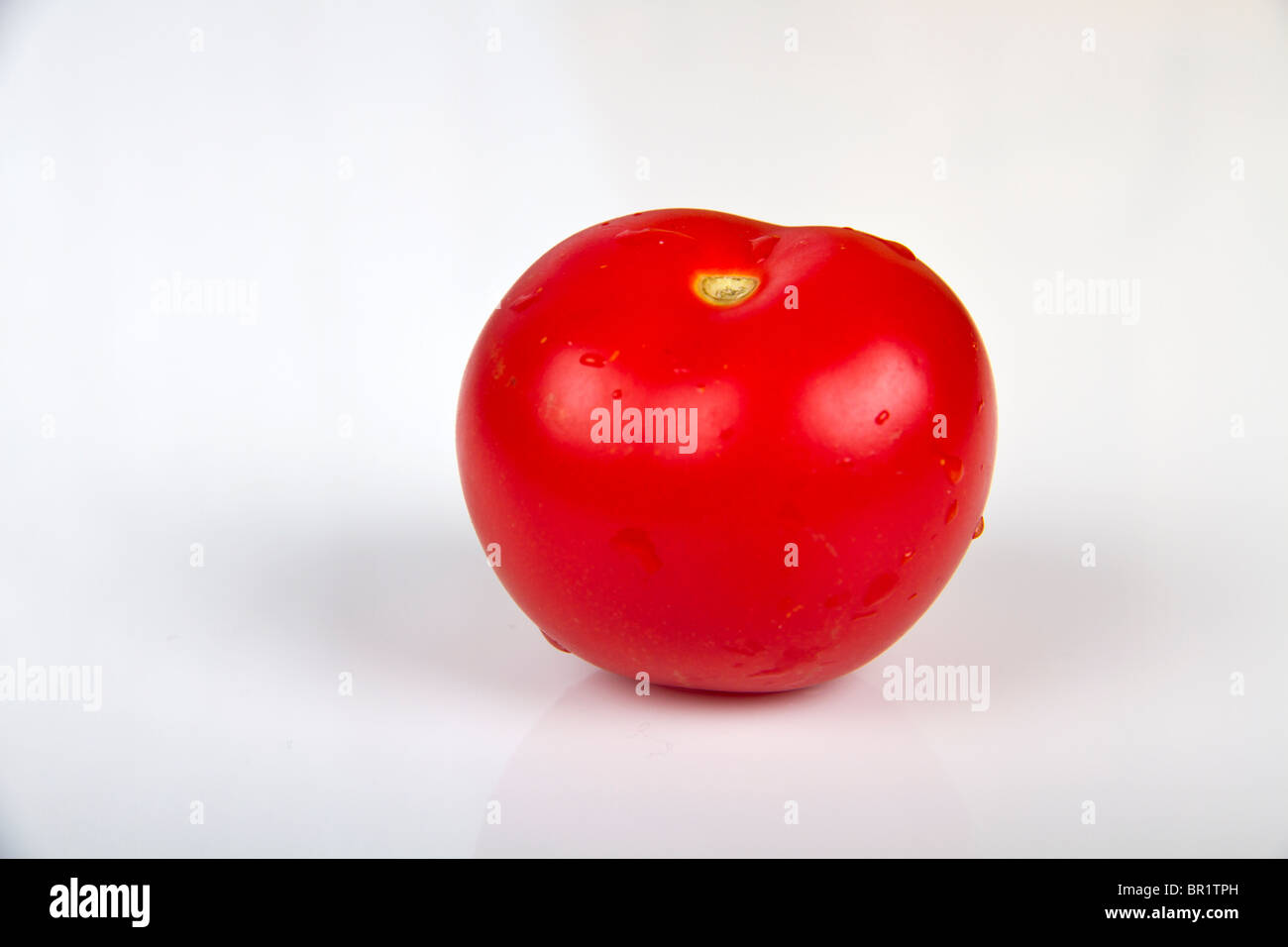 Cherry Red Tomato, isolated on white backdrop Stock Photo - Alamy