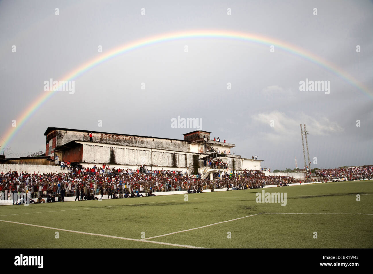 Rainbow over Liberian Football Stadium Stock Photo - Alamy