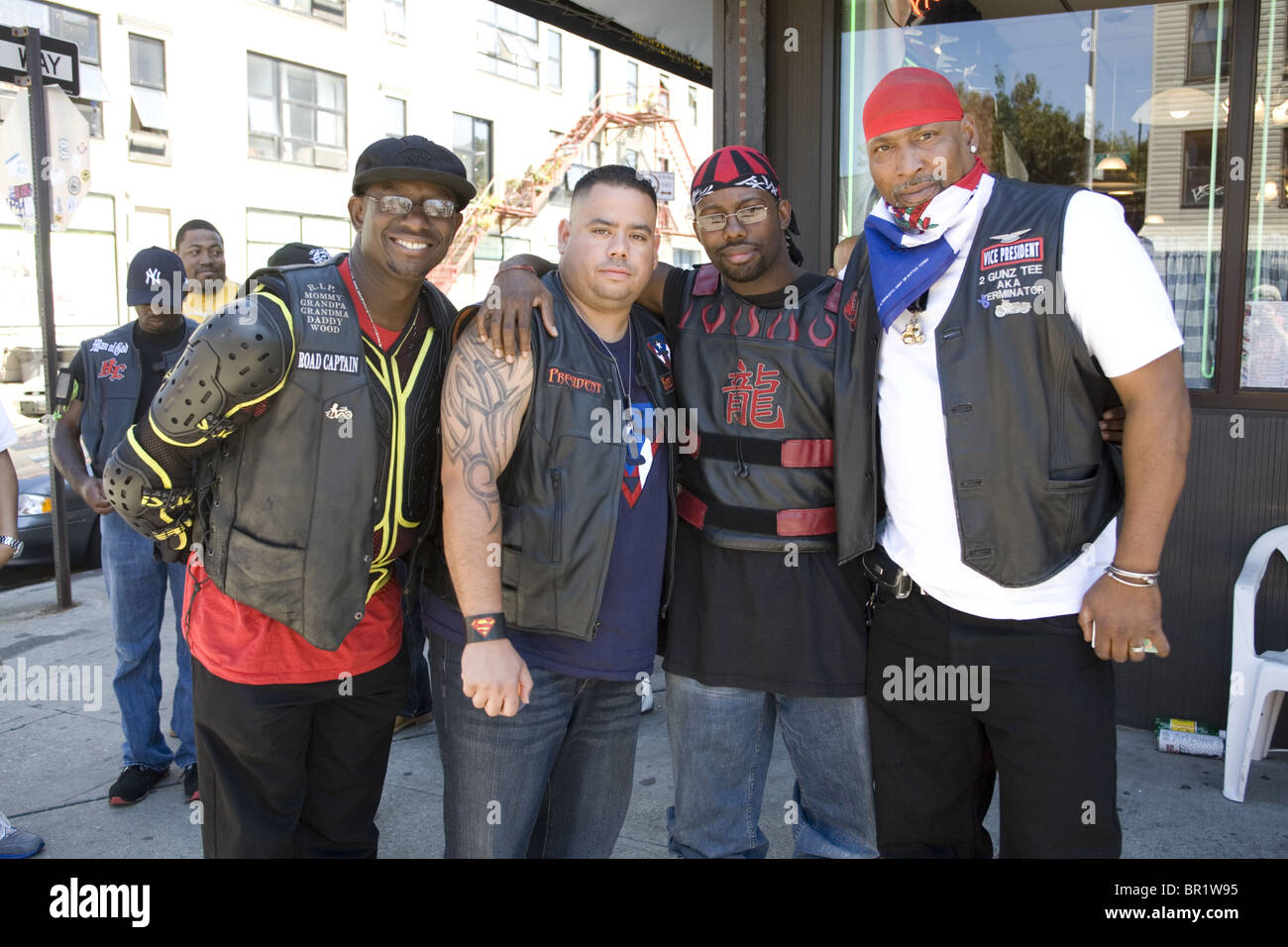 Members of various motor cycle clubs pose together before riding in the ...