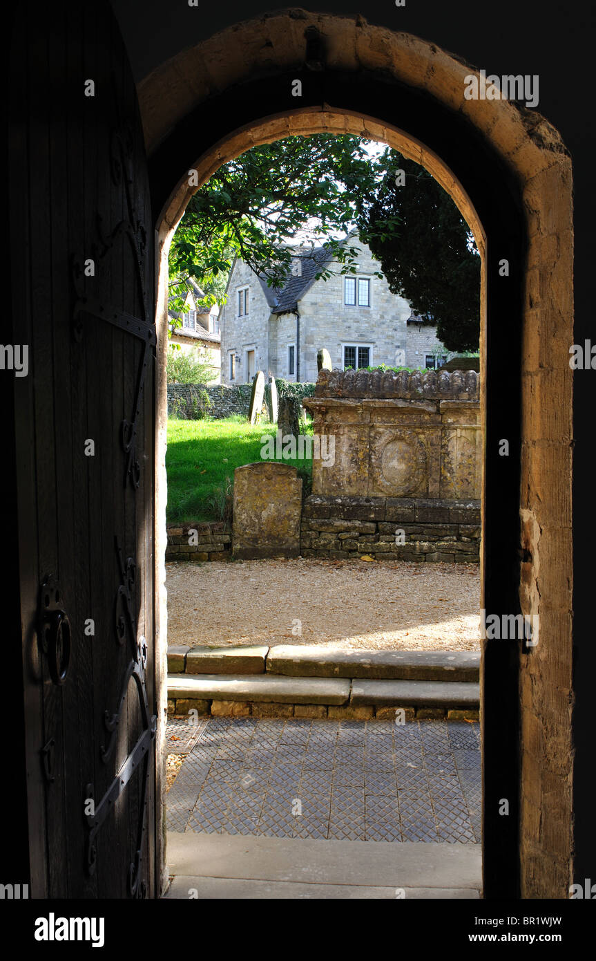 View from door of St. Peter`s Church, Windrush, Gloucestershire ...