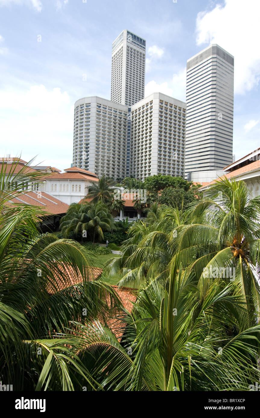 High rise buildings tower over vegetated courtyard Stock Photo - Alamy