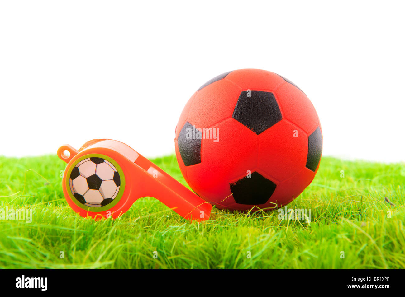 Dutch whistle and soccer ball in the playing fields Stock Photo - Alamy