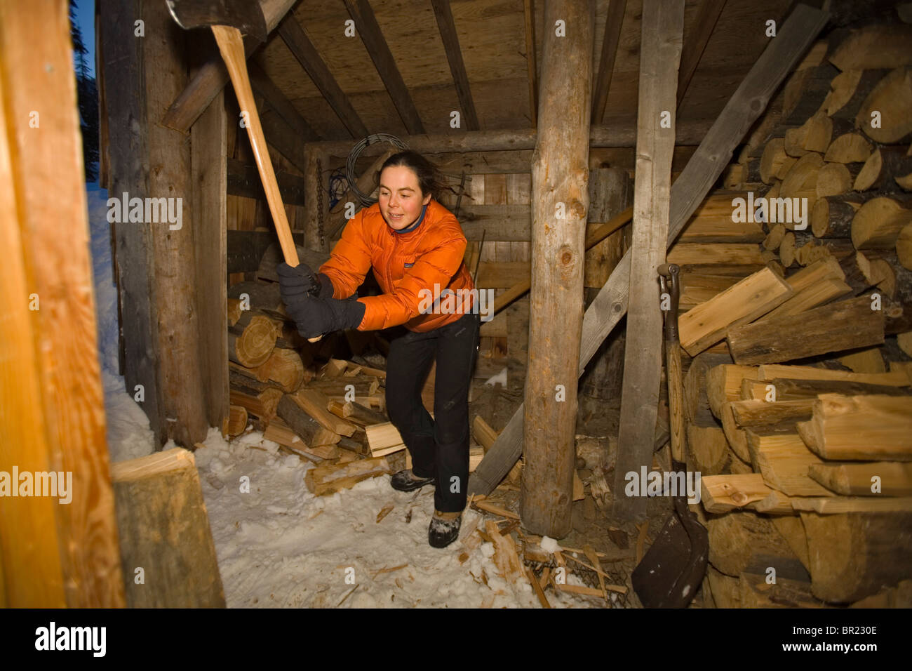 woman chopping wood, Canada Stock Photo - Alamy