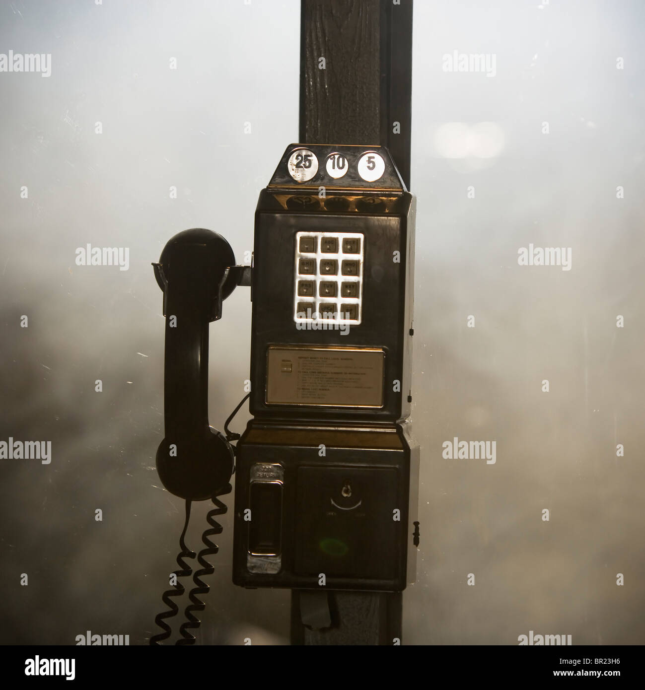 Coin operated phone Stock Photo - Alamy