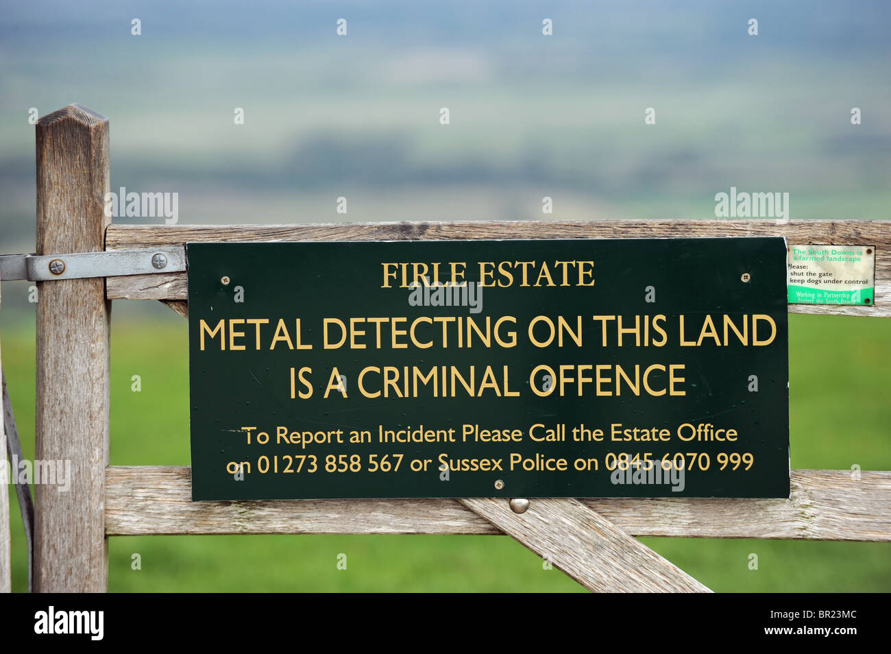 Metal Detecting ban warning sign on a gate on the South Downs Way at ...