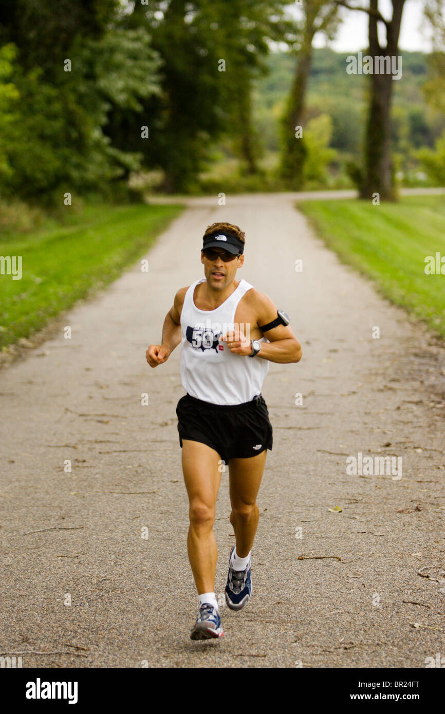 A single runner in a marathon in Des Moines, Iowa Stock Photo - Alamy