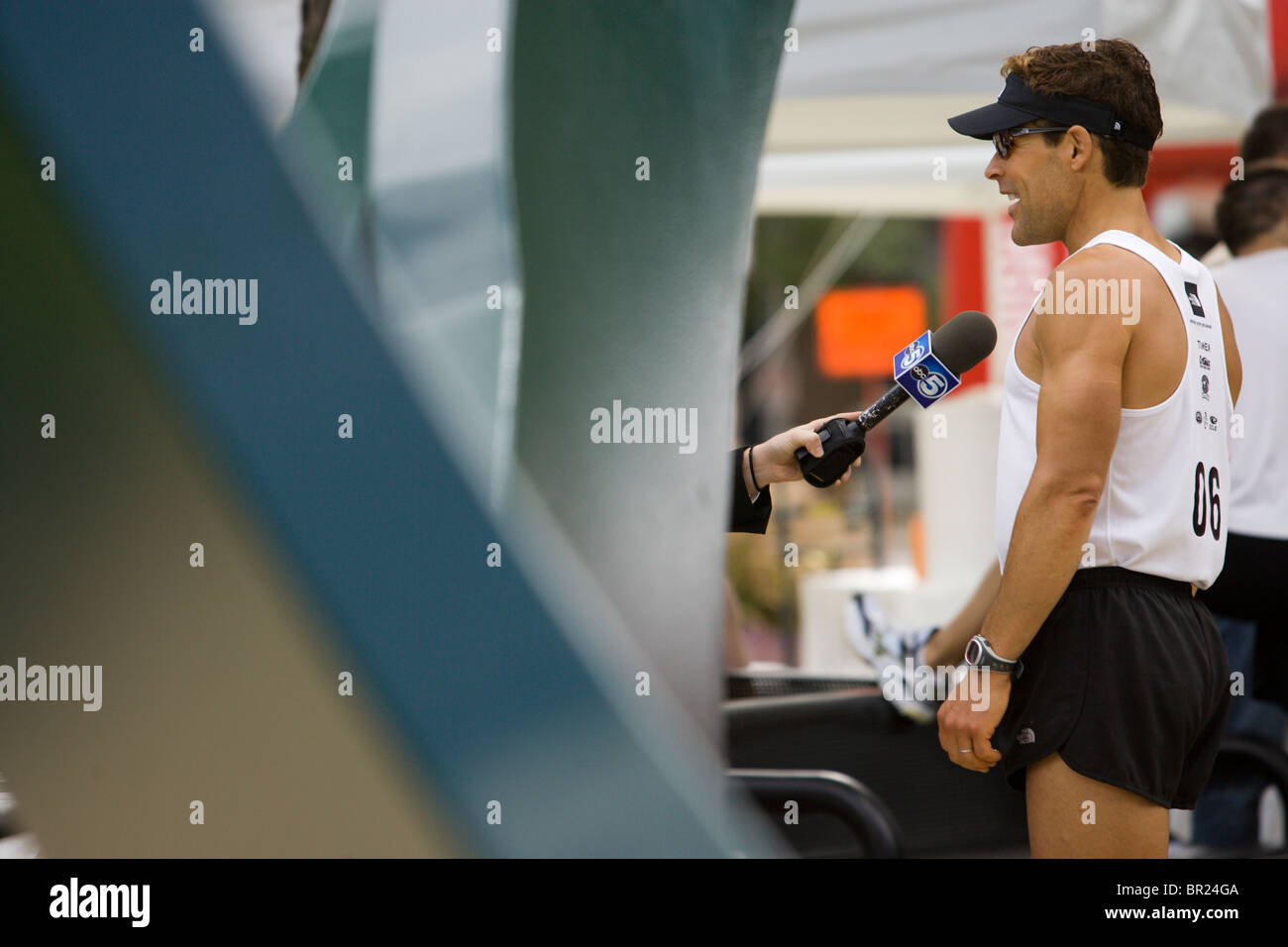 Runner being interviewed after a marathon in Des Moines, Iowa Stock ...