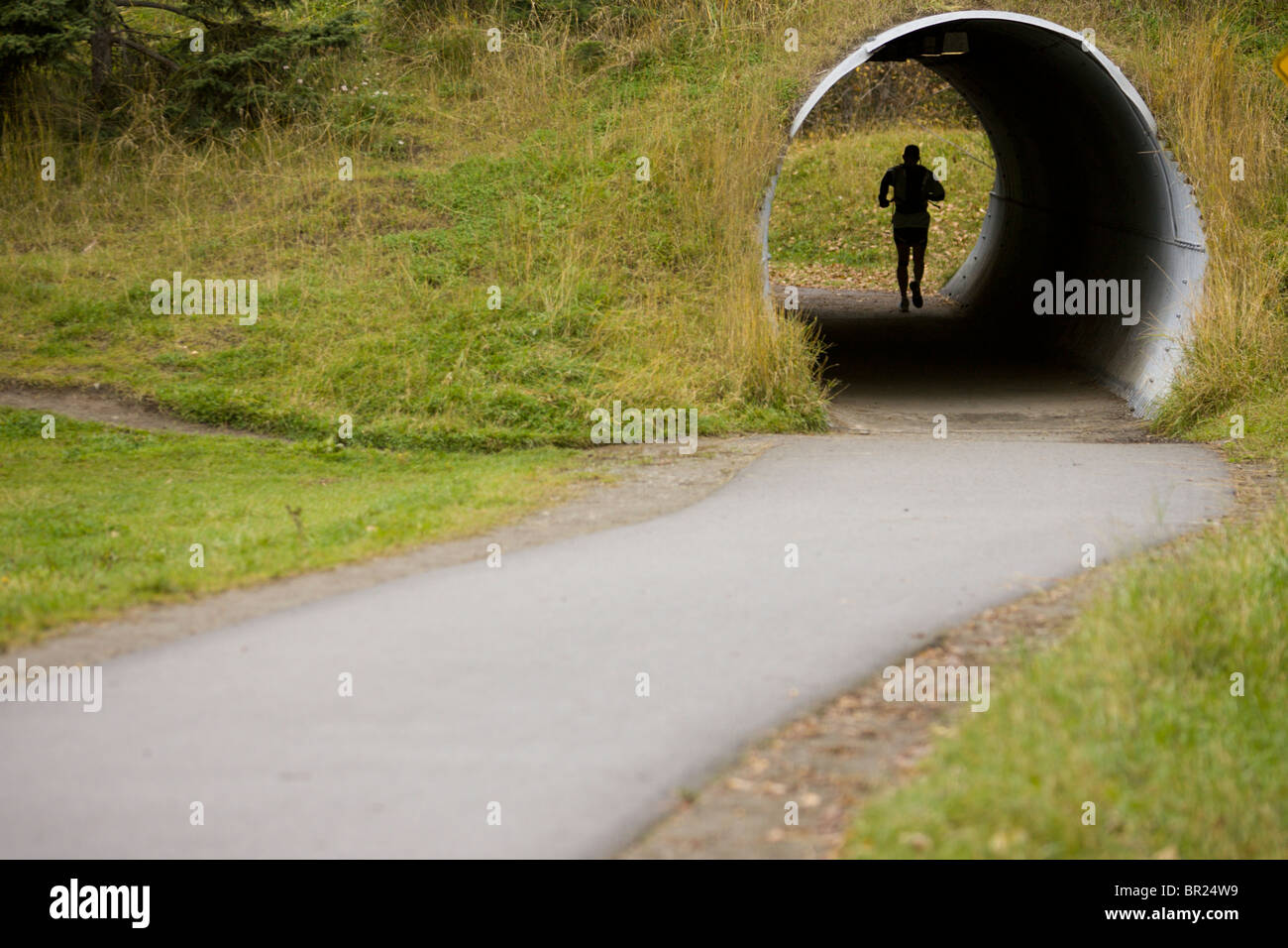 Tunnel running silhouette hi-res stock photography and images - Alamy