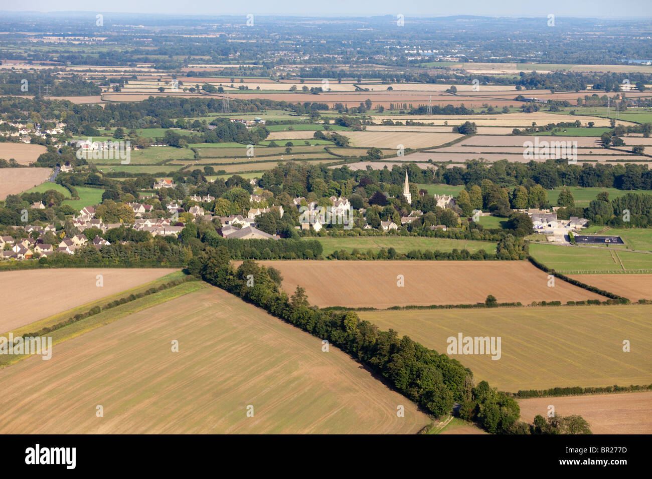 An aerial view of the Cotswold village of Kemble, Gloucestershire UK ...