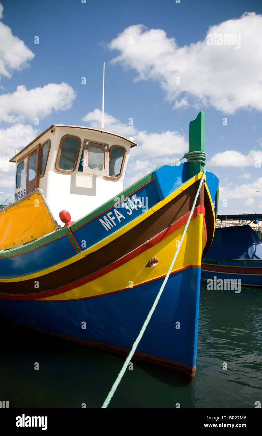 Gozo boat luzzu painted wooden fishing boat in traditional colours in ...