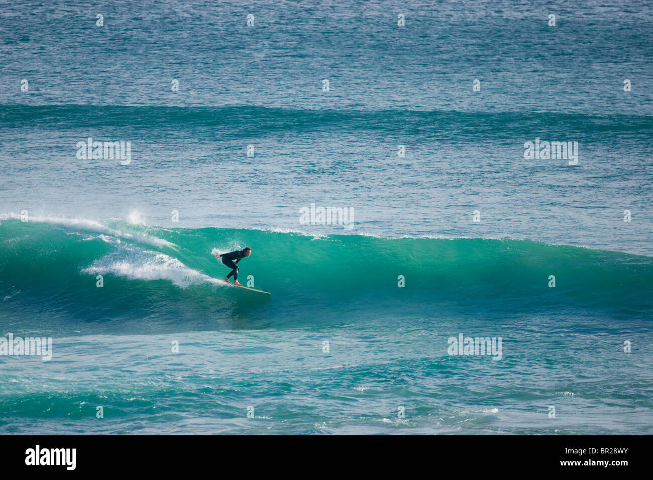 surfer on finless surfboard Stock Photo - Alamy