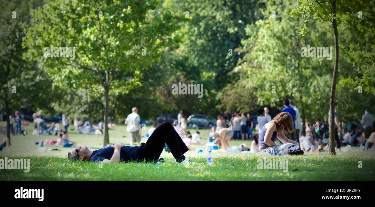 man relaxing in park Stock Photo - Alamy