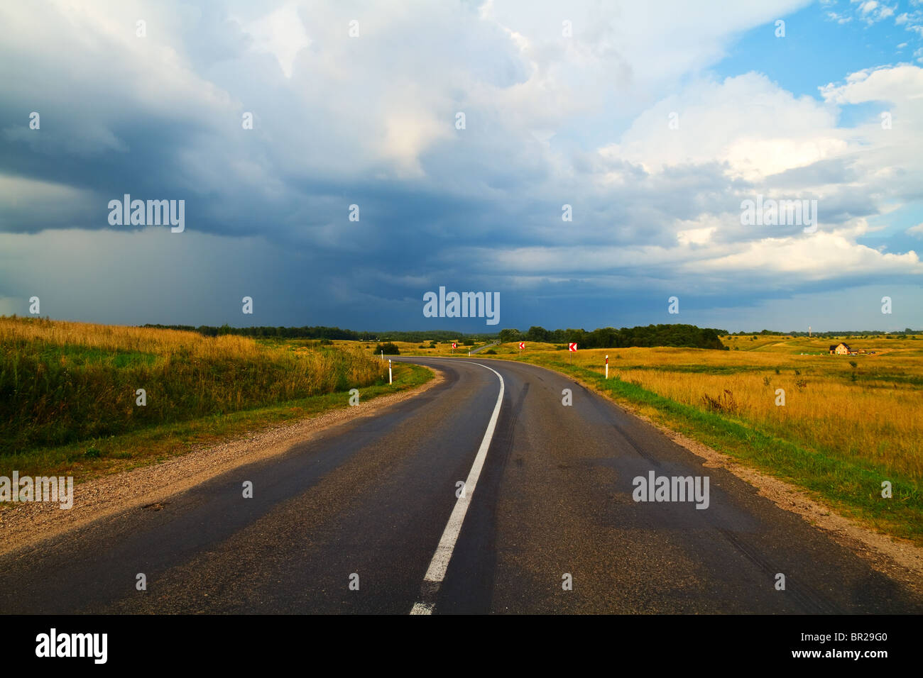 Road winding storm hi-res stock photography and images - Alamy