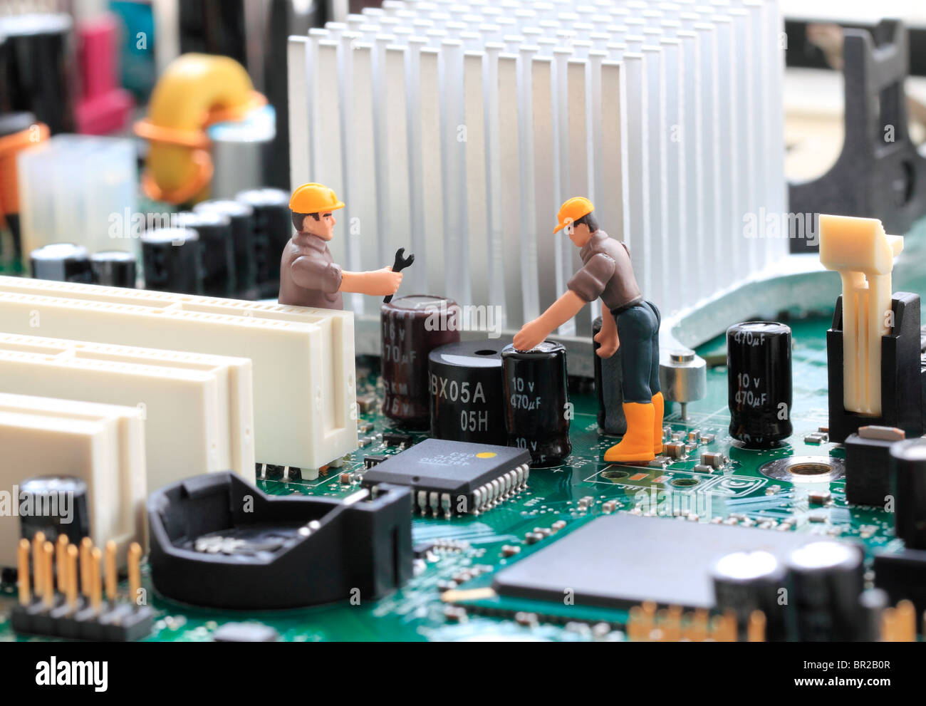 Technical Support - Macro photograph of a computer motherboard and two ...