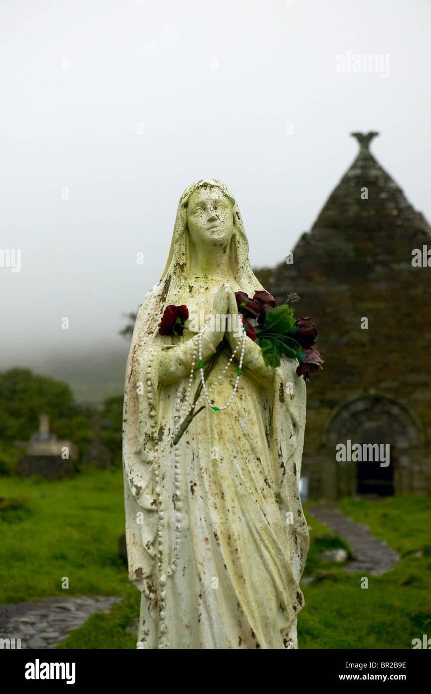 Statue of the Virgin Mary at Kilmalkedar Church in the Dingle Peninsula ...