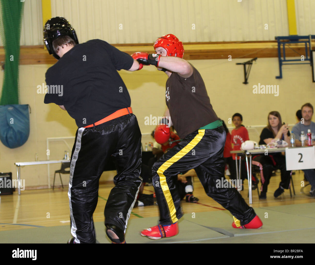 Competitors fighting in a kickboxing tournament Stock Photo - Alamy