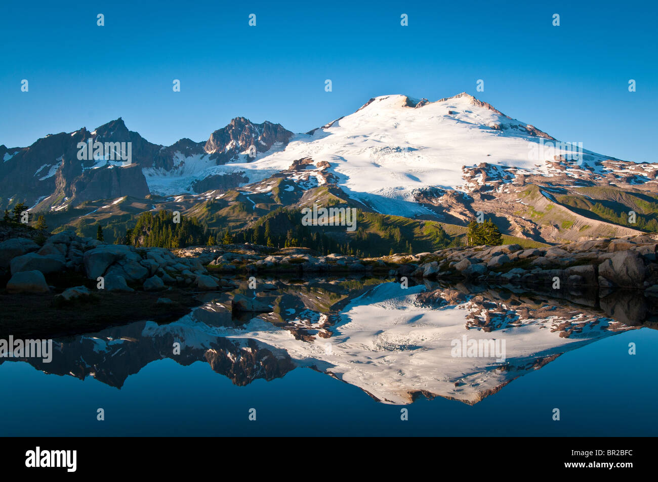Mount Baker and reflection in tarn; Park Butte Trail, Mount Baker ...