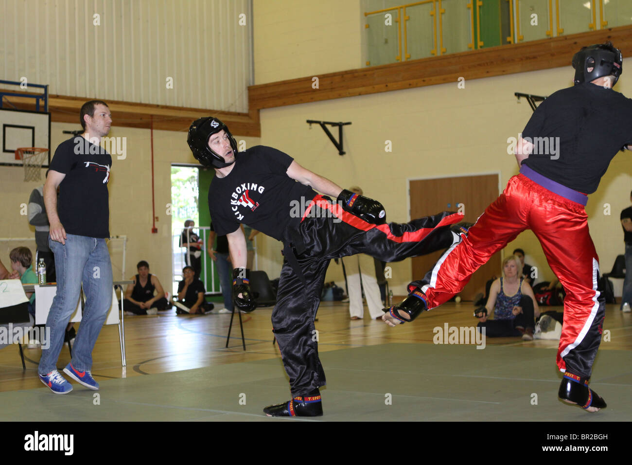 Competitors fighting in a kickboxing tournament Stock Photo - Alamy