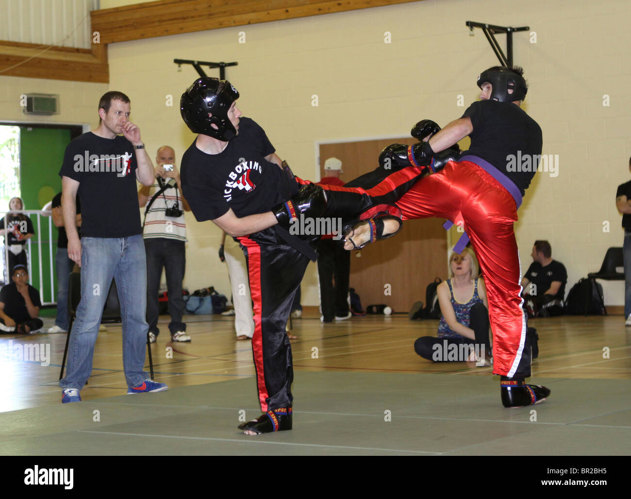 Competitors fighting in a kickboxing tournament Stock Photo - Alamy