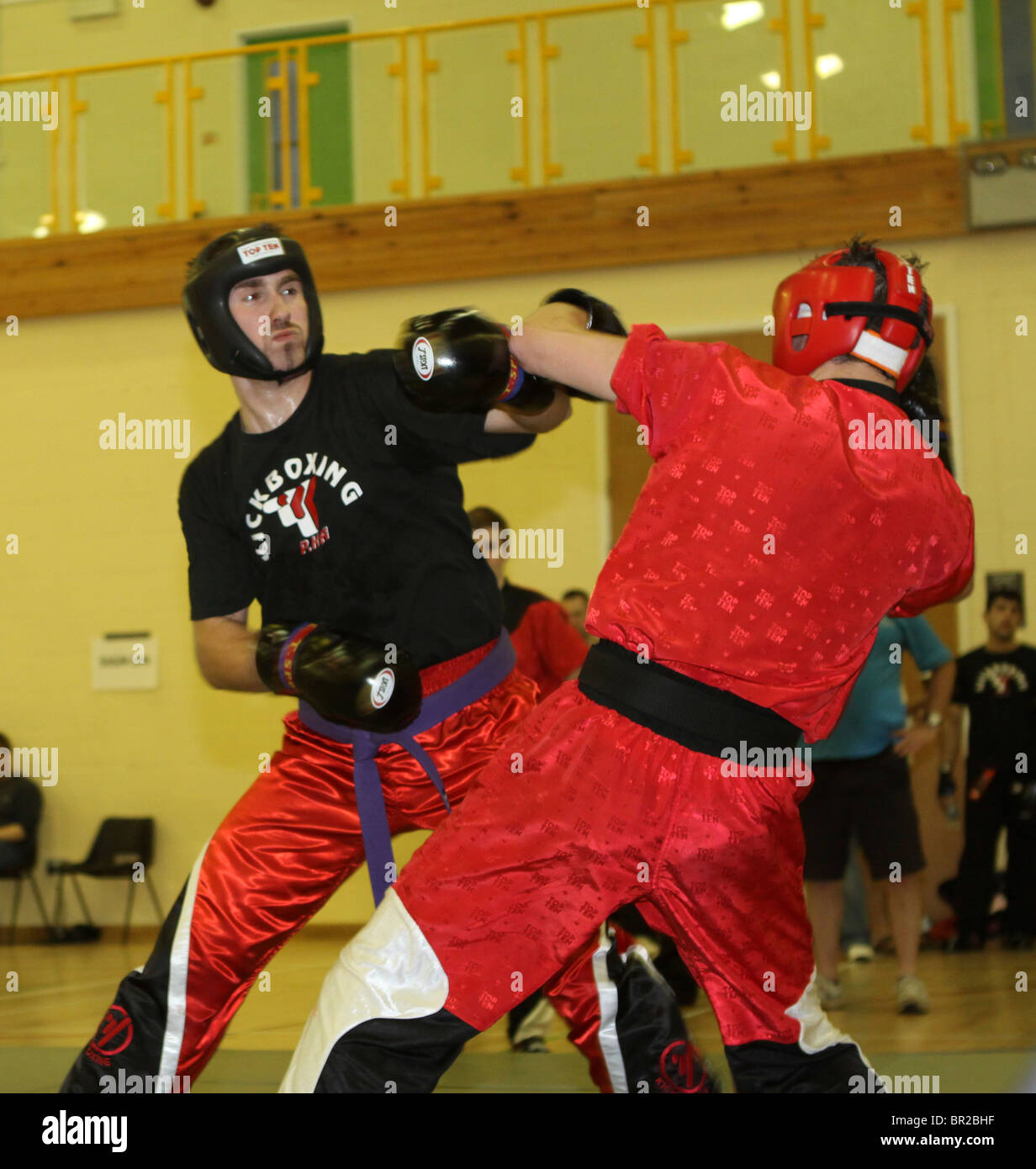 Competitors fighting in a kickboxing tournament Stock Photo - Alamy