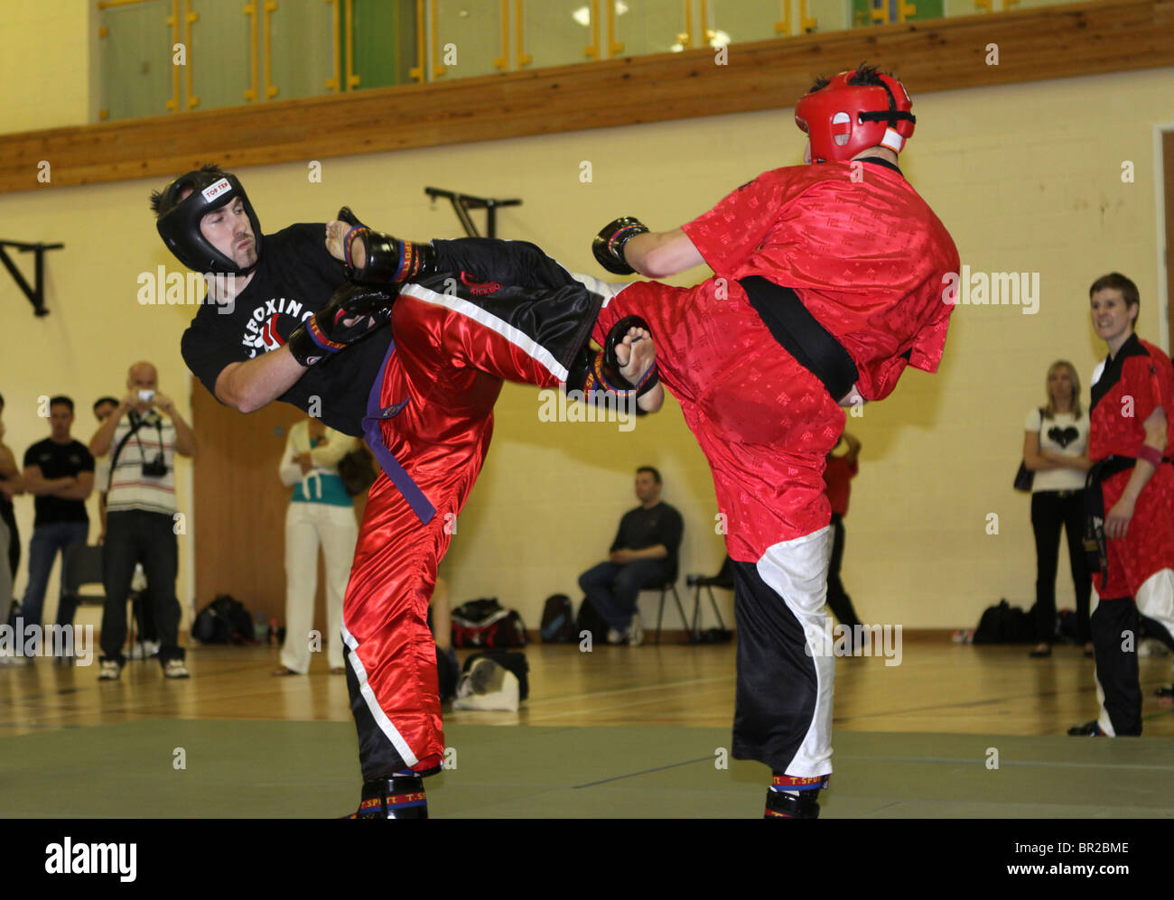 Competitors fighting in a kickboxing tournament Stock Photo - Alamy