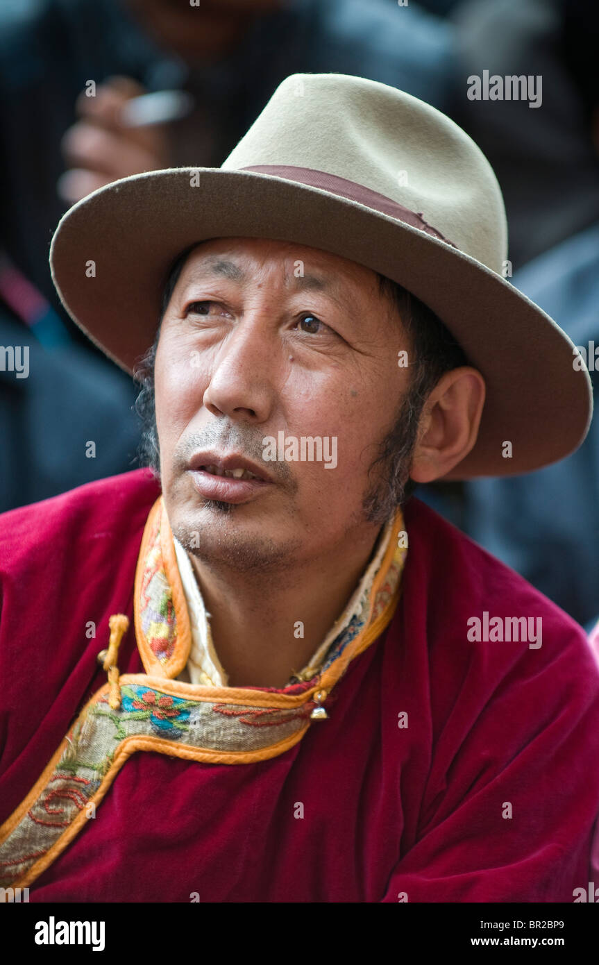 Ethnic Tibetan man attends folk dance and music festival, Danba ...