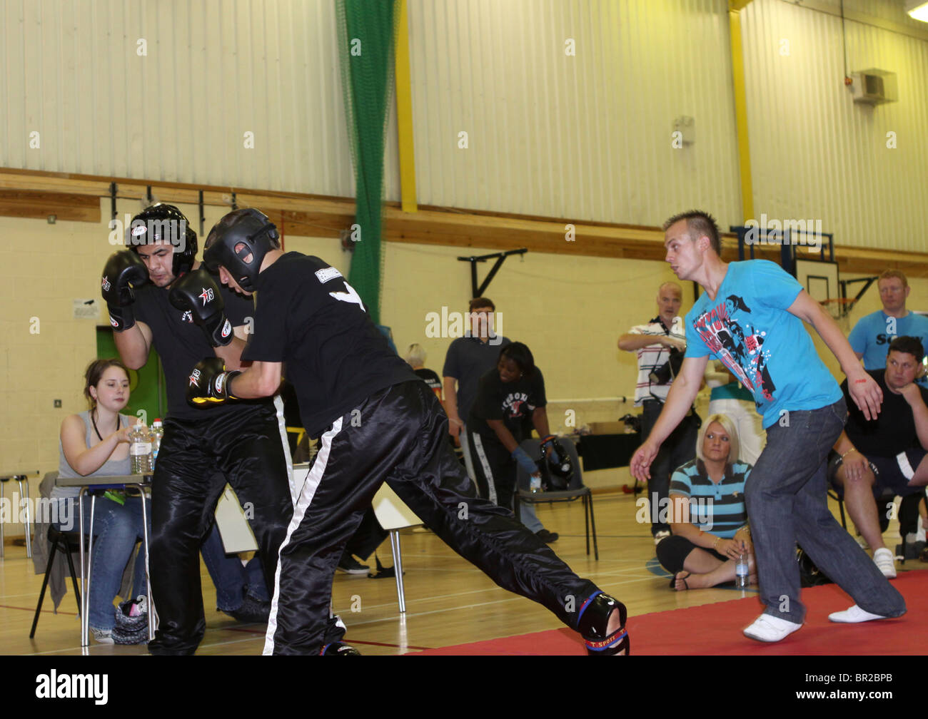 Competitors fighting in a kickboxing tournament Stock Photo - Alamy