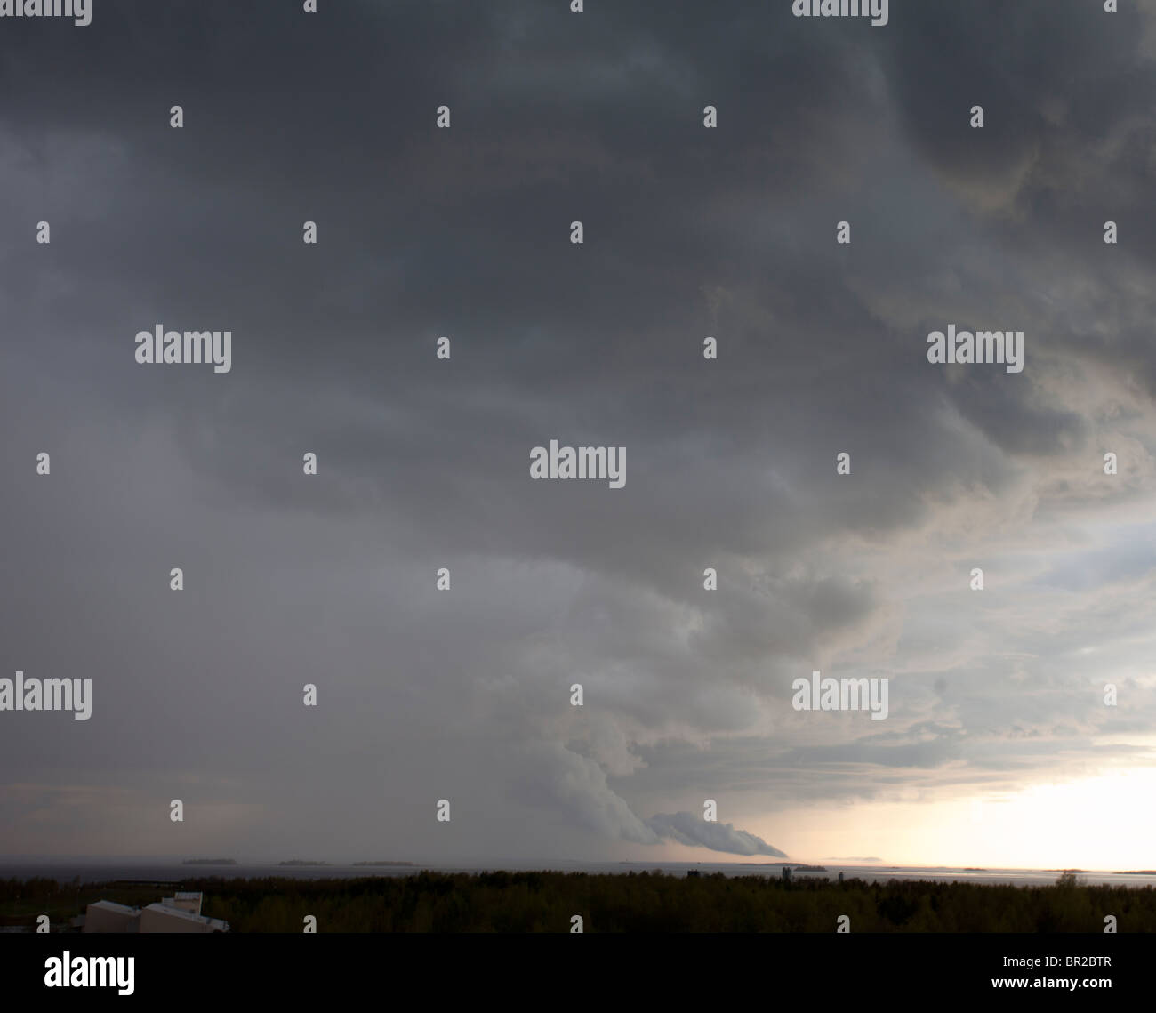 Rainstorm clouds rising from horizon , Finland Stock Photo - Alamy