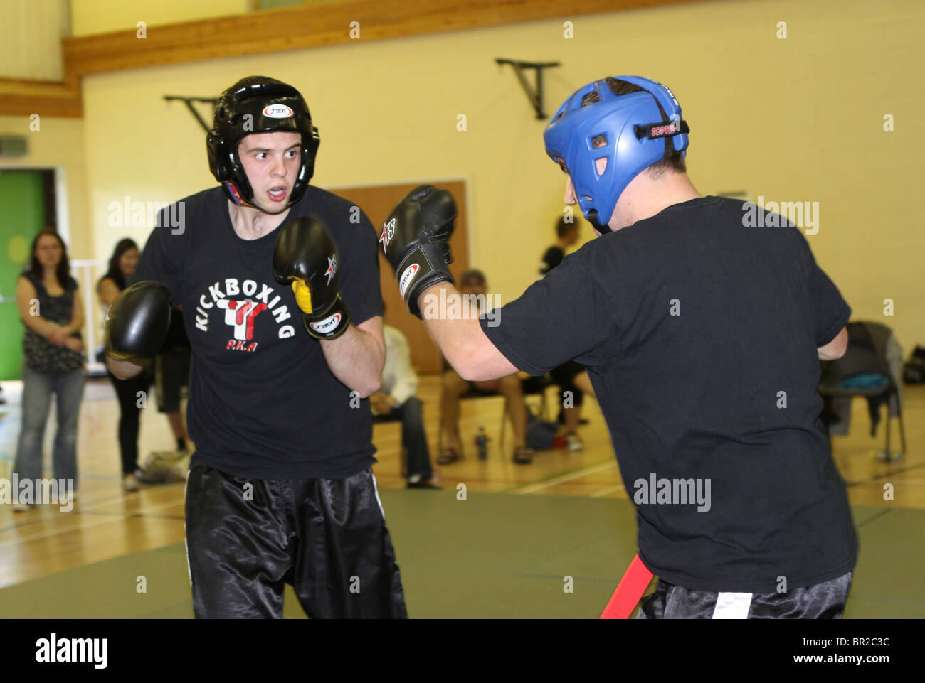 Competitors fighting in a kickboxing tournament Stock Photo - Alamy