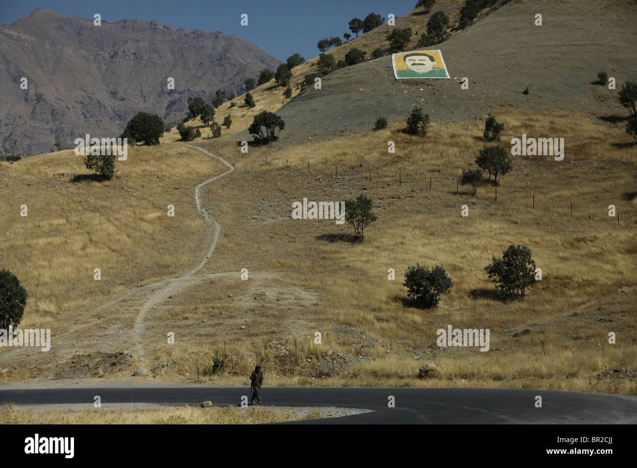 Huge figure of former PKK militant leader Abdullah Ocalan in a hillside ...