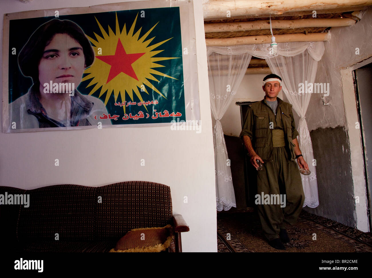 A Kurdish fighter of the Kurdistan Free Life Party (PJAK) from Iran ...