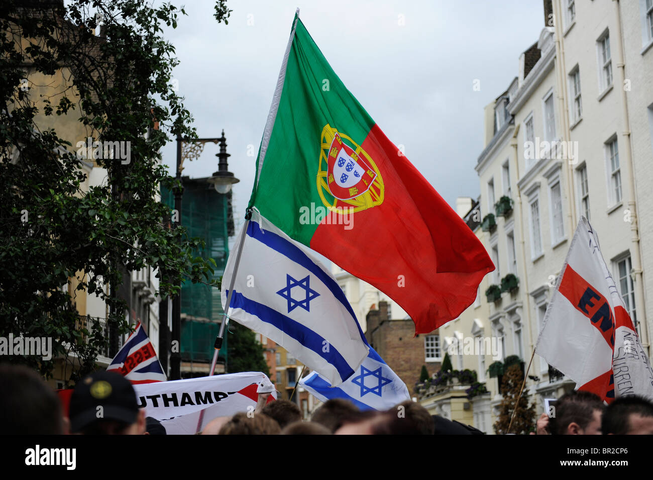 EDL supporters flags at protest outside Saudi Embassy London Stock ...
