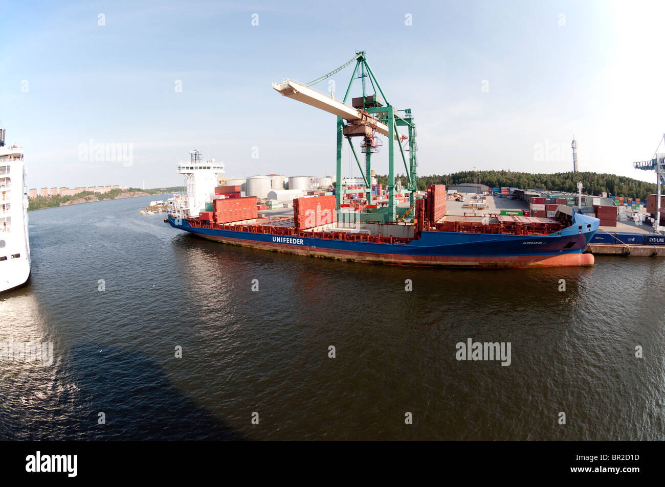 A fisheye photograph of the container ship 'Aldebaran J' being loaded ...