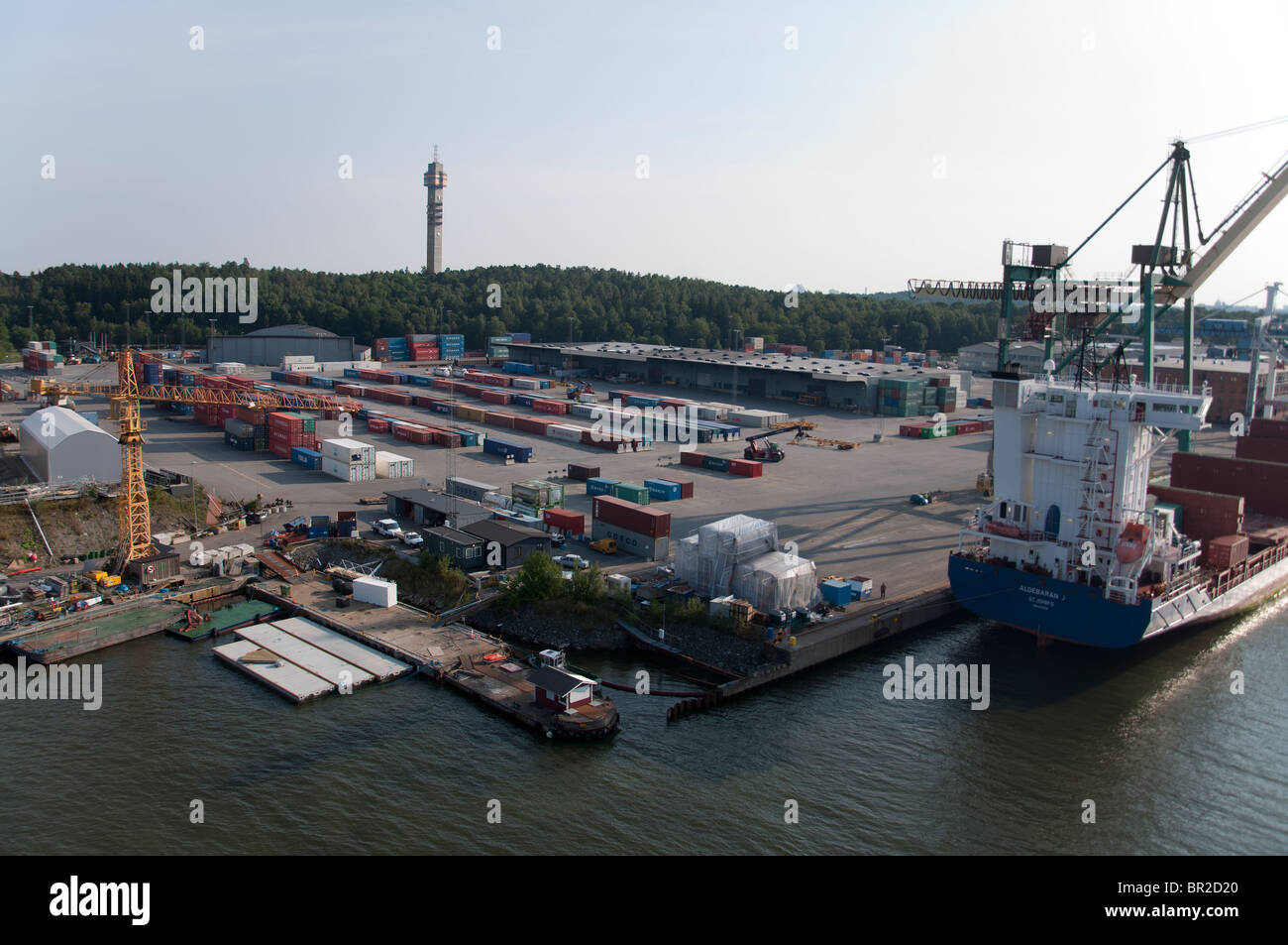 Shipping containers stacked up in the port of Stockholm, Sweden ready ...