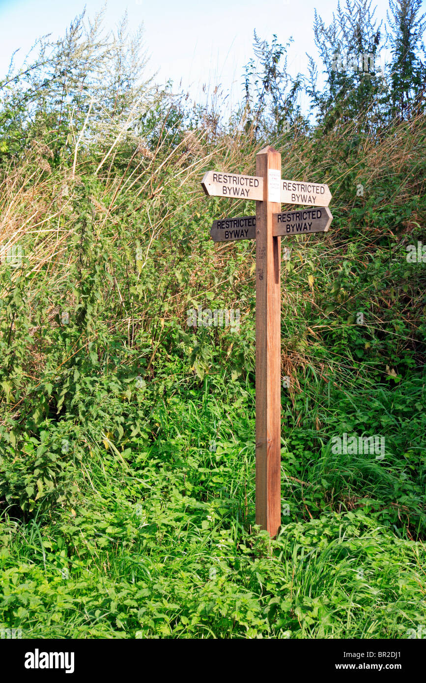 Restricted byway sign at junction of footpath crossways at Saxlingham ...