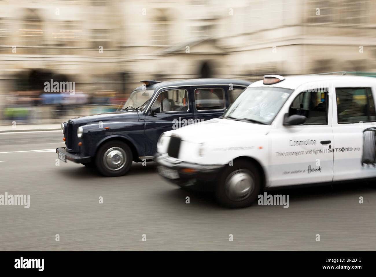 London taxis at speed Stock Photo - Alamy
