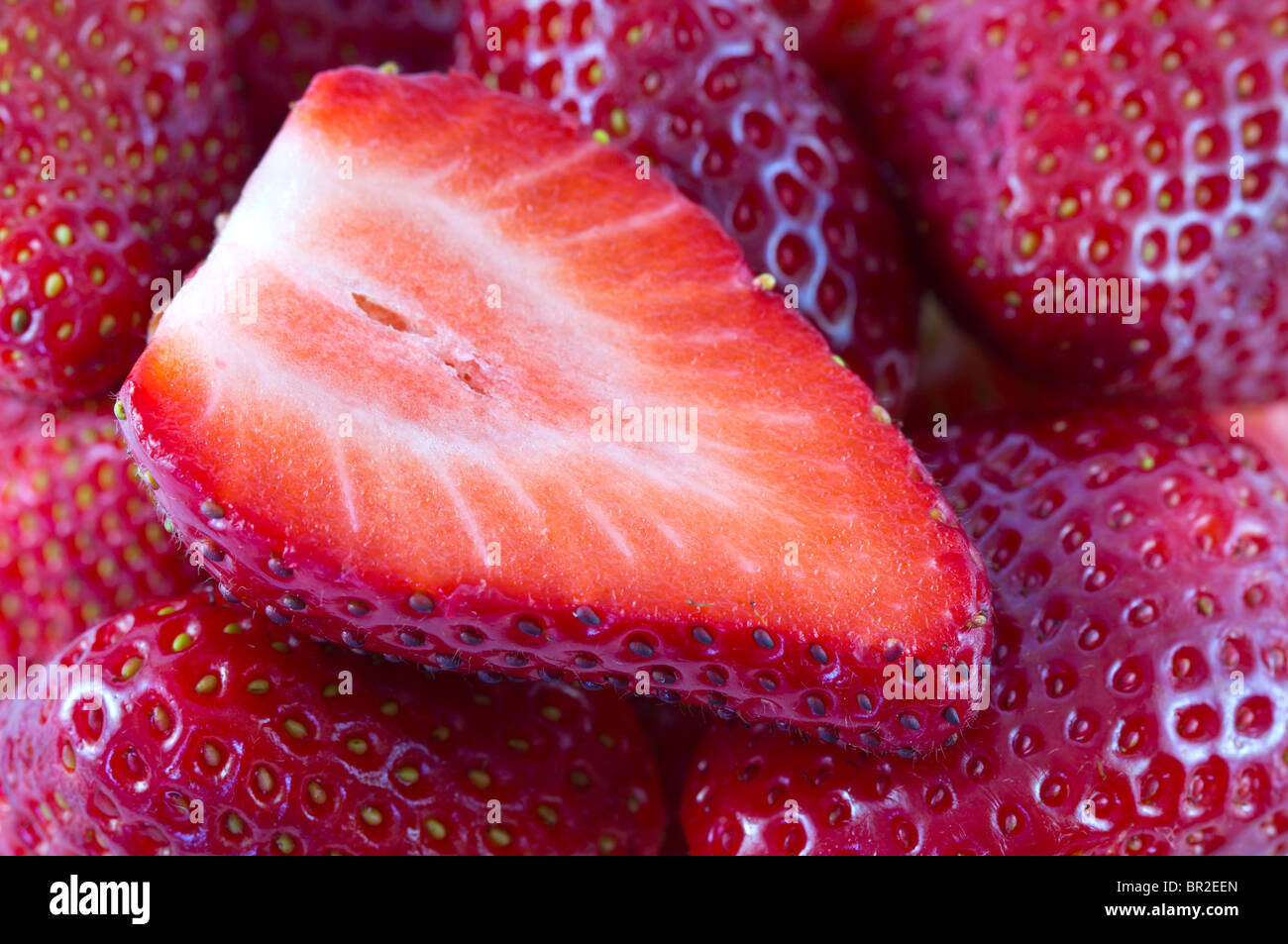 Fruit halved red fruit berry hi-res stock photography and images - Alamy