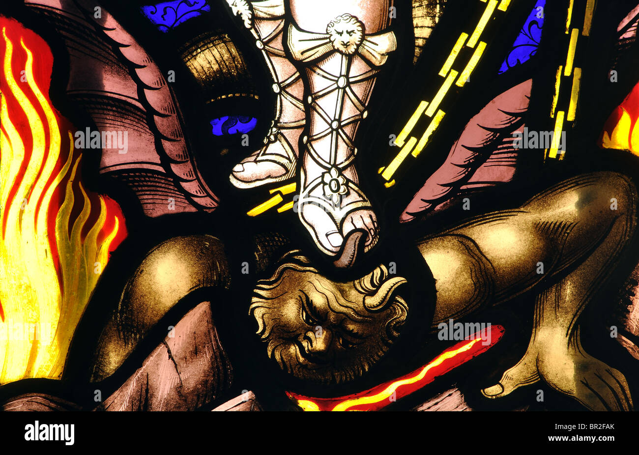Detail of St. Michael and the devil stained glass, St. Michael`s Church ...