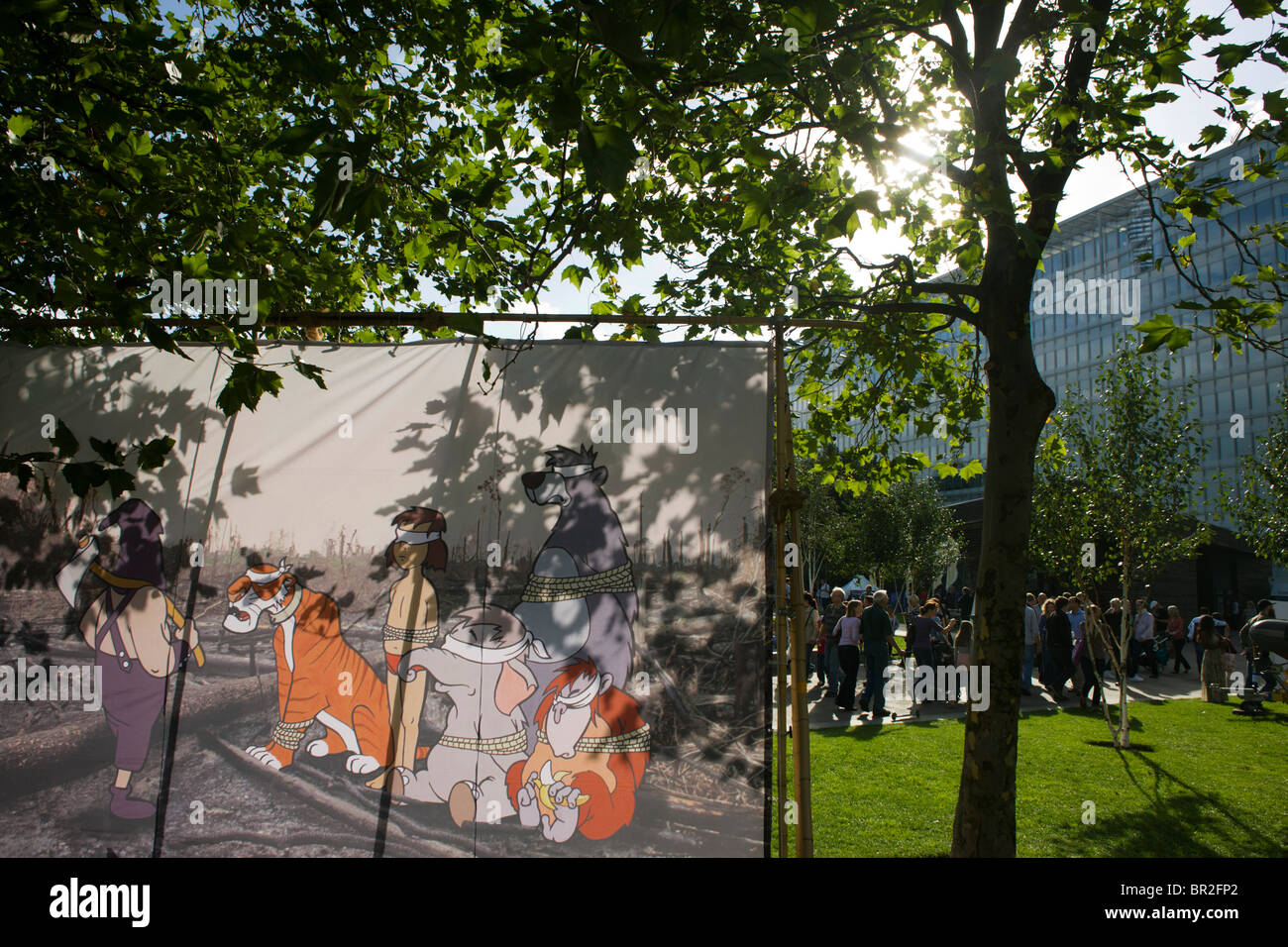 Backdrop of Banksy / Disney Jungle Book characters to illustrate de ...