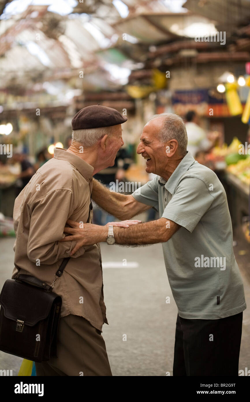 Old men greet hi-res stock photography and images - Alamy