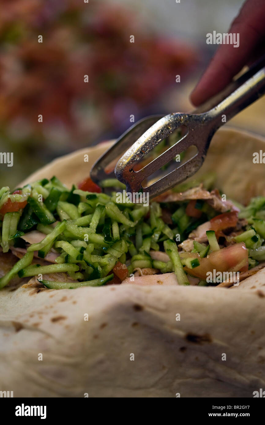A man prepares a shawarma, King Shawarma Restaurant, Jerusalem, Israel ...