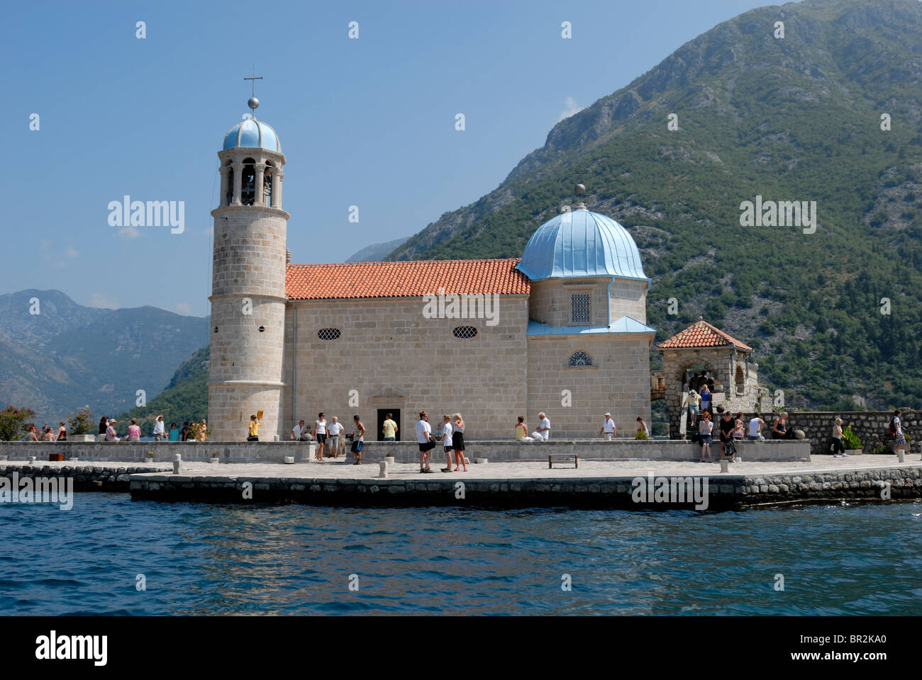 A fine view to the artificial island of Gospa of Skrpjela, Our Lady of ...
